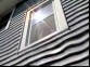 Reflecting sun melting and warping vinyl siding | EZ Snap®